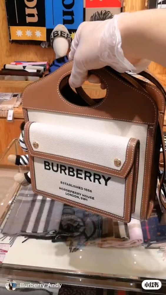 Burberry Mini Pocket Bag in Canvas and Leather - The Fashion world Co.