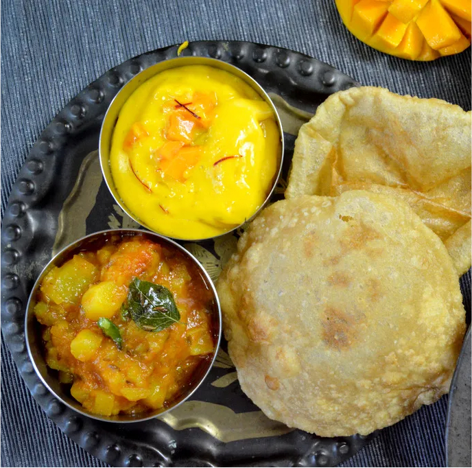 Puri & Aloo Curry with mango pulp - Jyoti's Vegetarian